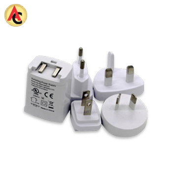 Universal travel adapter outputs 1A at 12V | Global Sources
