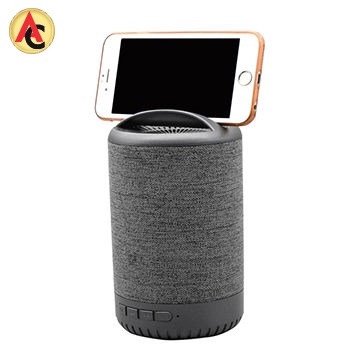 Mobile phone-holder Bluetooth speaker | Global Sources