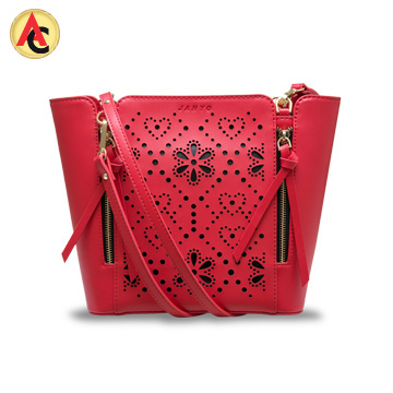 Genuine leather shoulder bag has laser-cut hollow-out patterns | Global ...