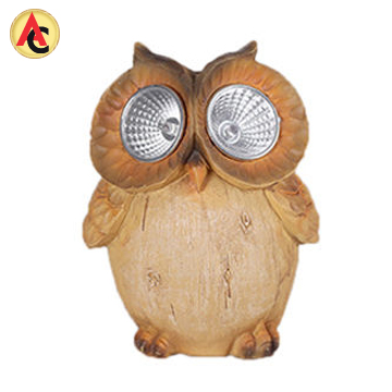 Polyresin garden owl has LED lamp eyes | Global Sources